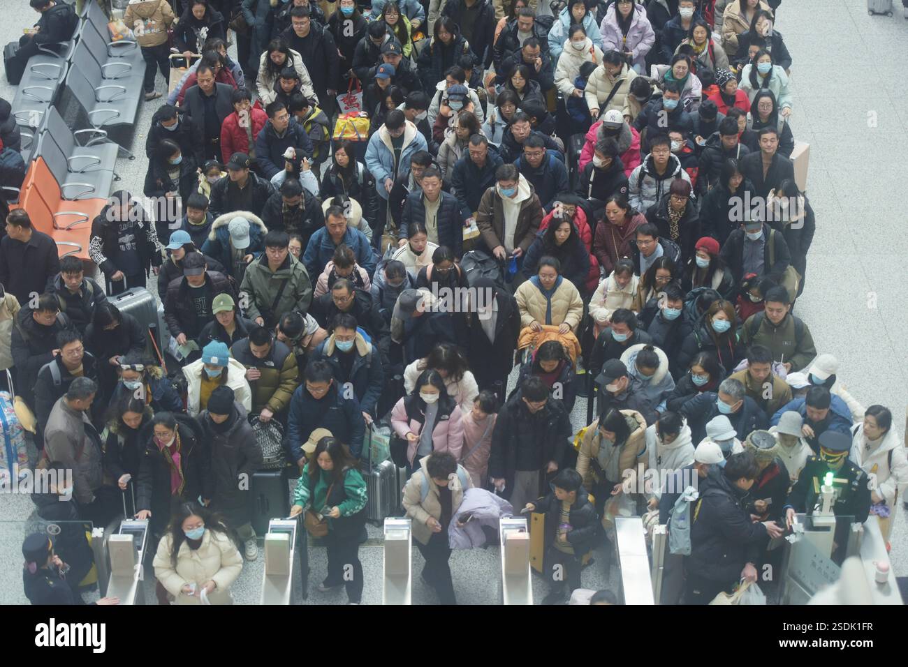 Passengers are seen at Hangzhoudong railway station in Hangzhou City ...