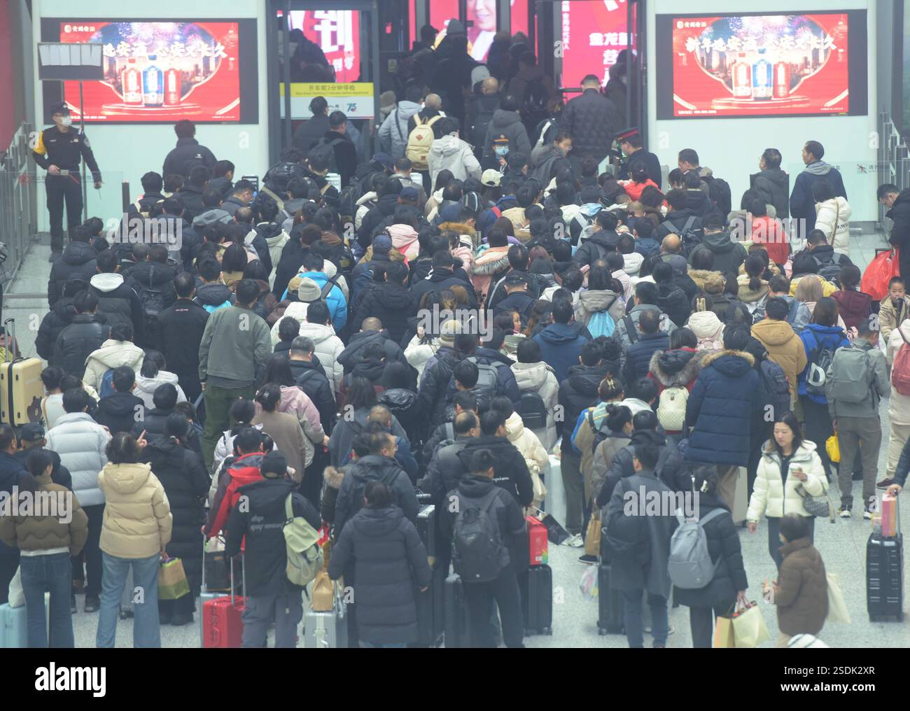 Passengers are seen at Hangzhoudong railway station in Hangzhou City ...