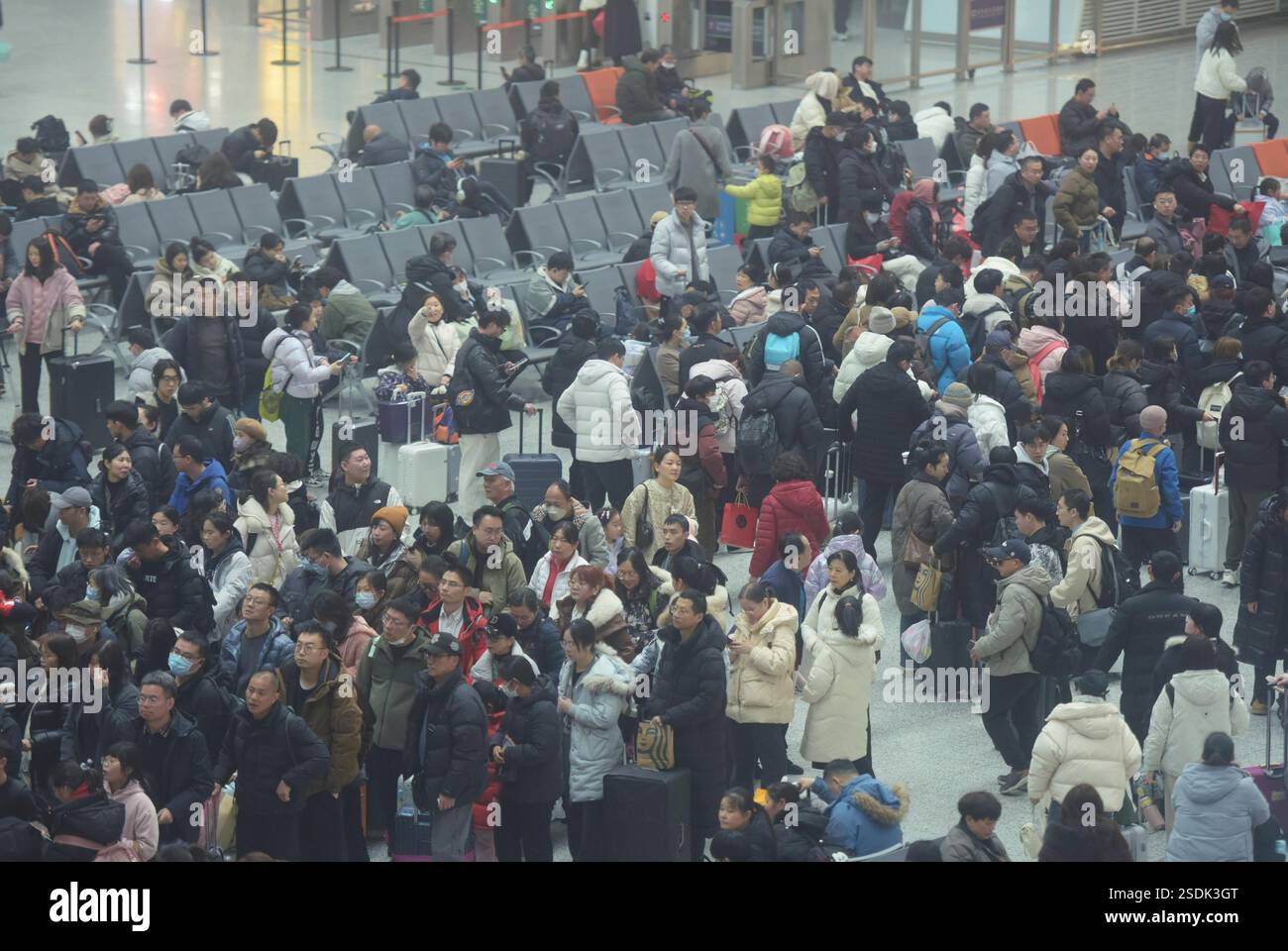 Passengers are seen at Hangzhoudong railway station in Hangzhou City ...