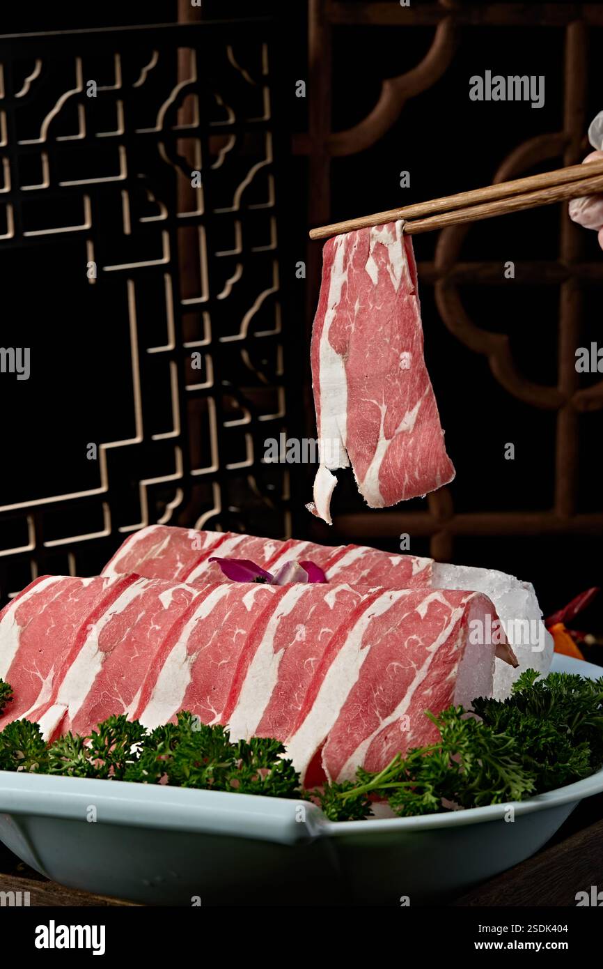 Premium hot pot ingredients Wagyu beef slices Stock Photo - Alamy