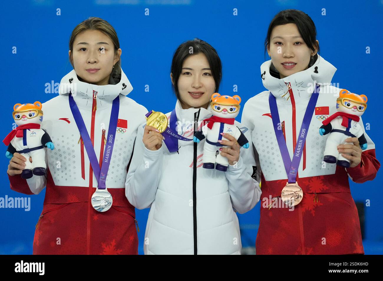 South Korea gold medalist Gilli Kim, center, poses beside China silver ...