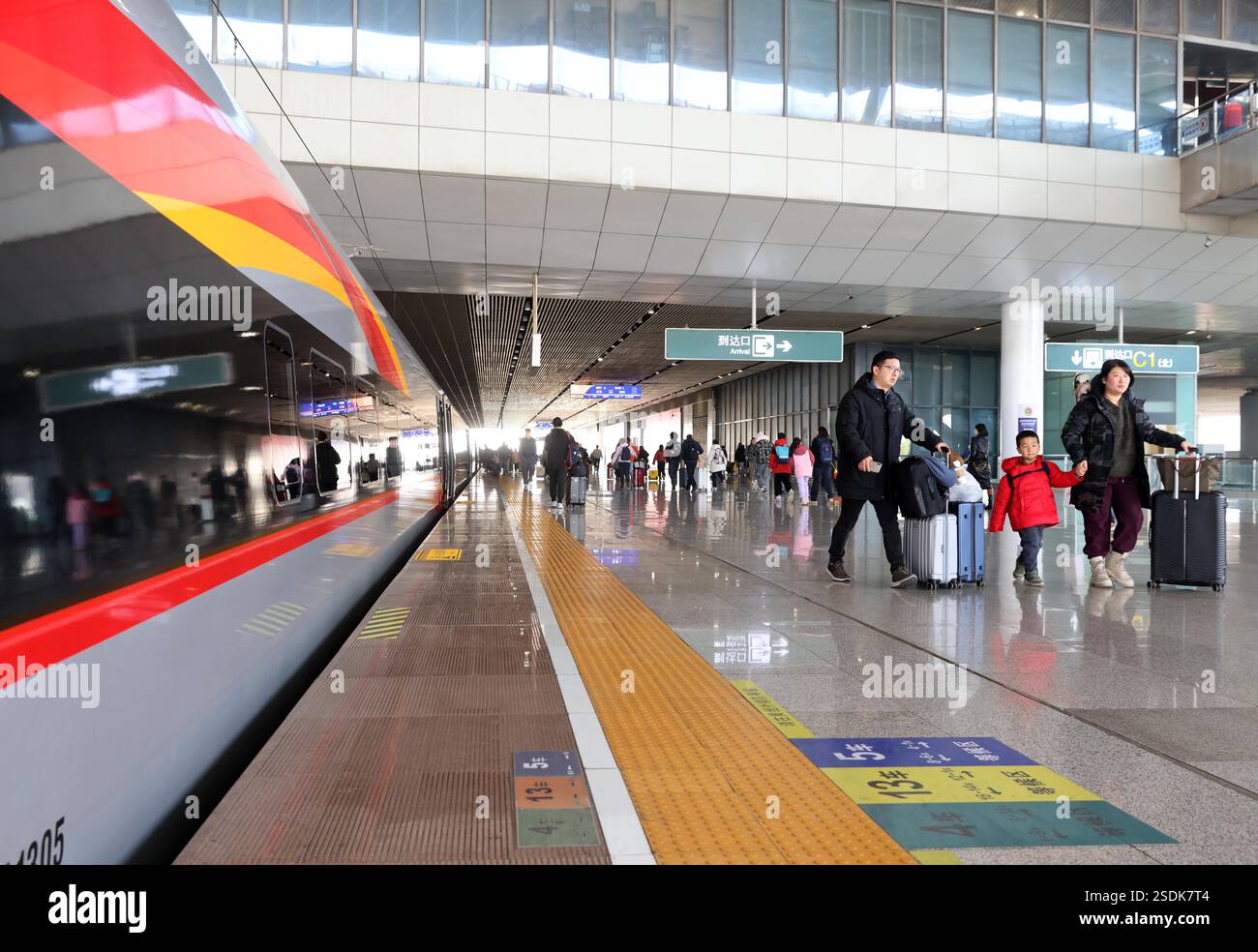 Passengers are seen at Wuhan railway station in Wuhan City, central ...