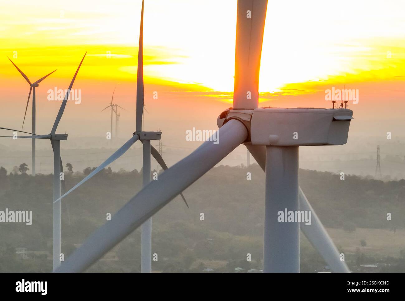 Wind farm field and sunset sky. Wind power. Sustainable, renewable ...