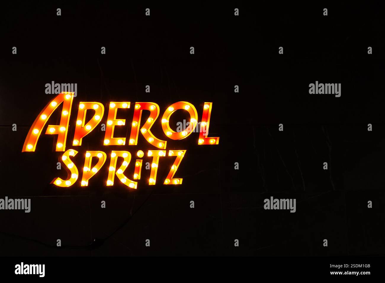 Malaga, Spain, 28 December 2024 Bright neon sign advertizing Aperol ...