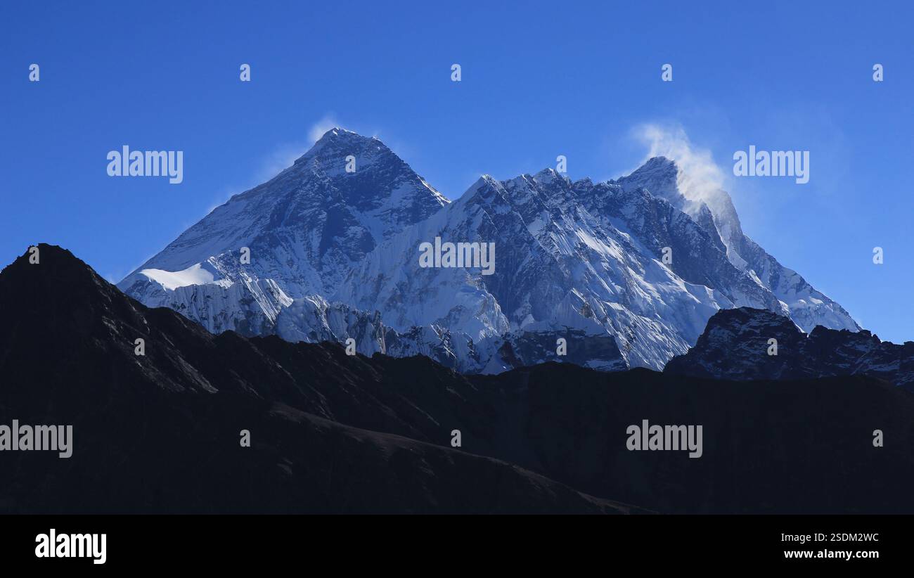 Wind blowing snow over Mount Everest and Lhotse, Nepal Stock Photo - Alamy