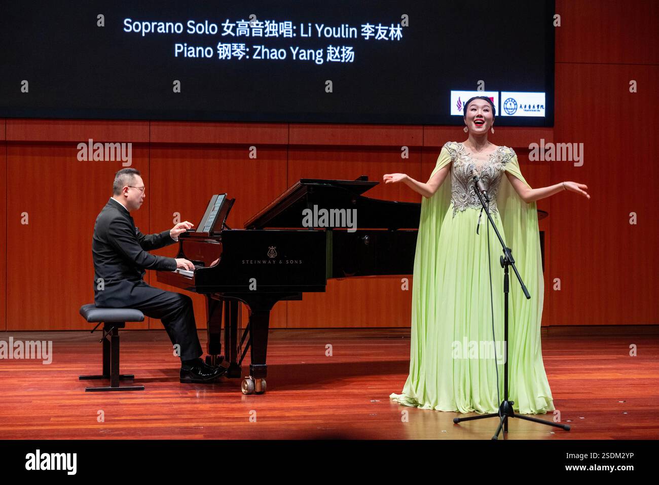 Kuala Lumpur, Malaysia. 6th Feb, 2025. Chinese singer Li Youlin (R ...