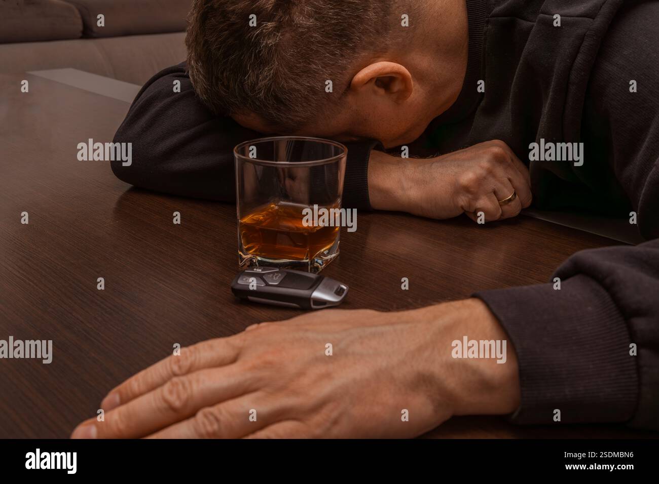 Drunk man lying unconscious in hi-res stock photography and images - Alamy