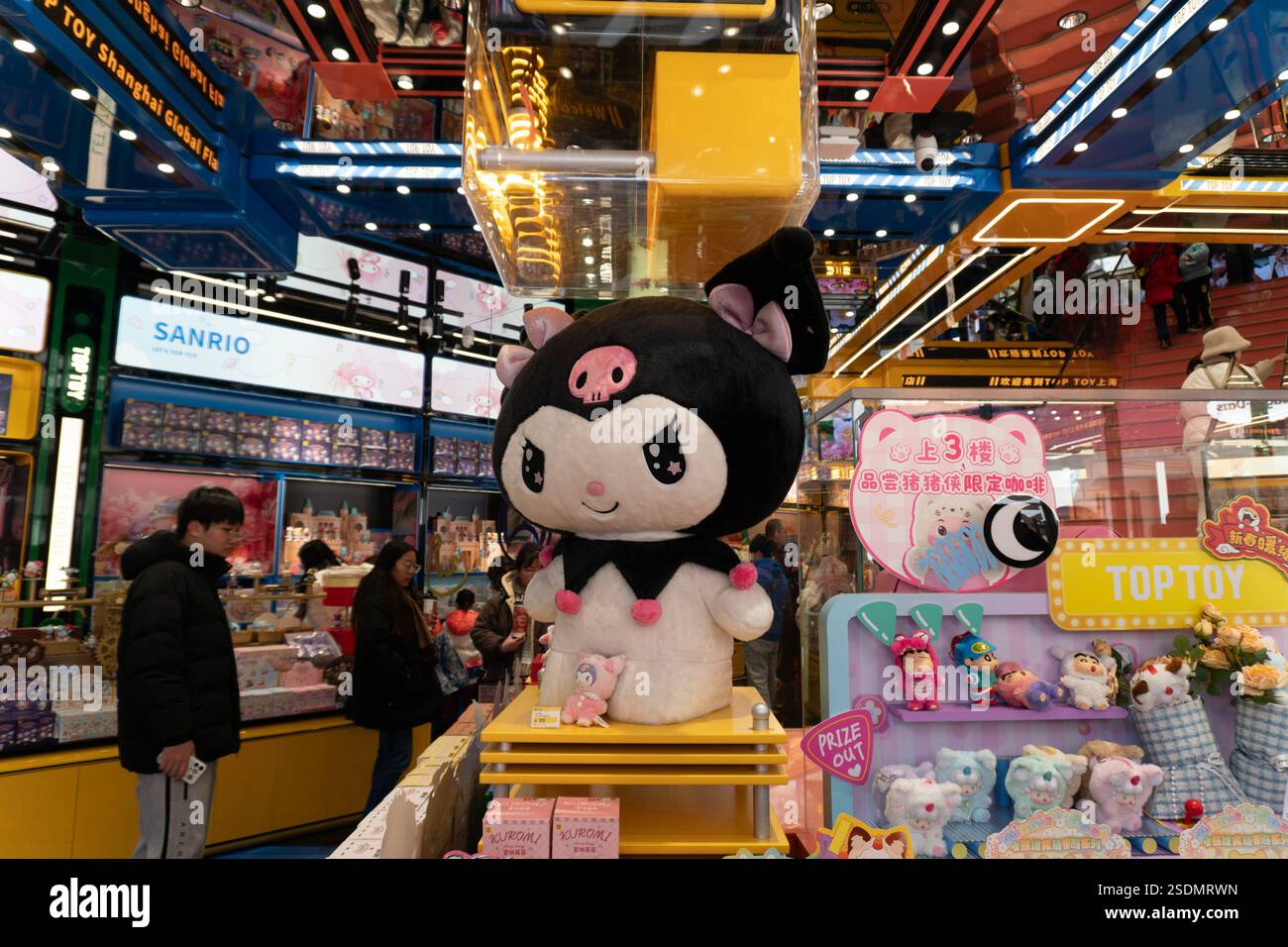 Customers shop at the newly opened flagship store of TOP TOY Tide Play ...