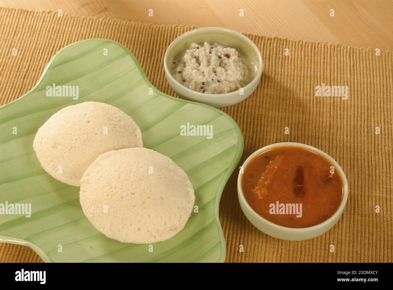 Vegetarian, Indian food two idlis with coconut chutney sambar on banana ...