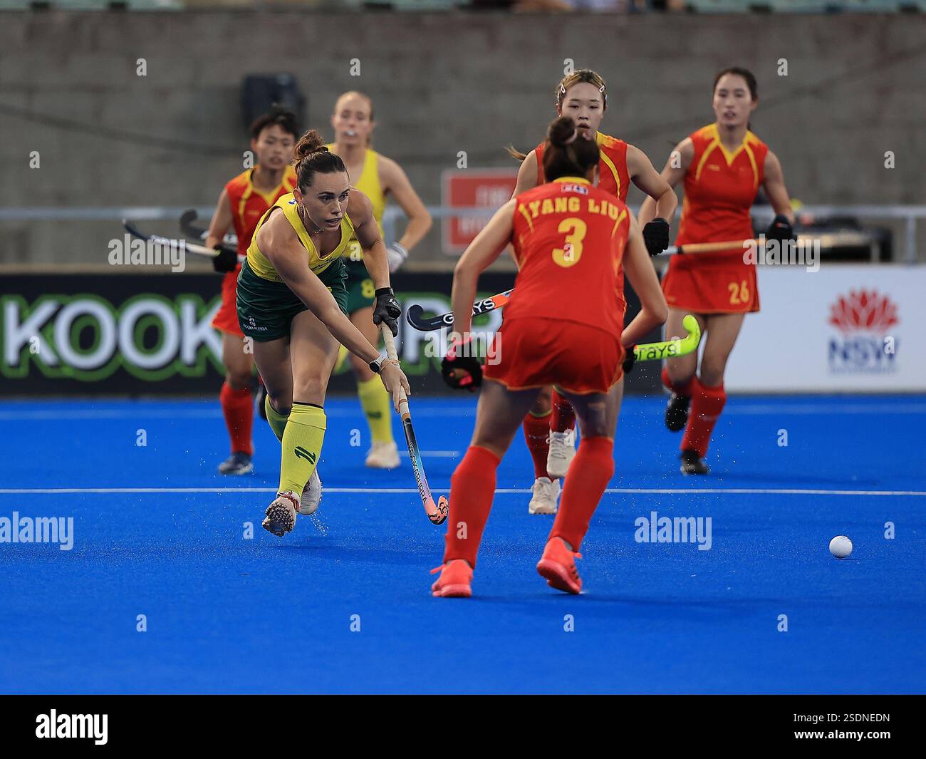 Greta Hayes #12 (Left) of Australia seen in action against China in FIH ...