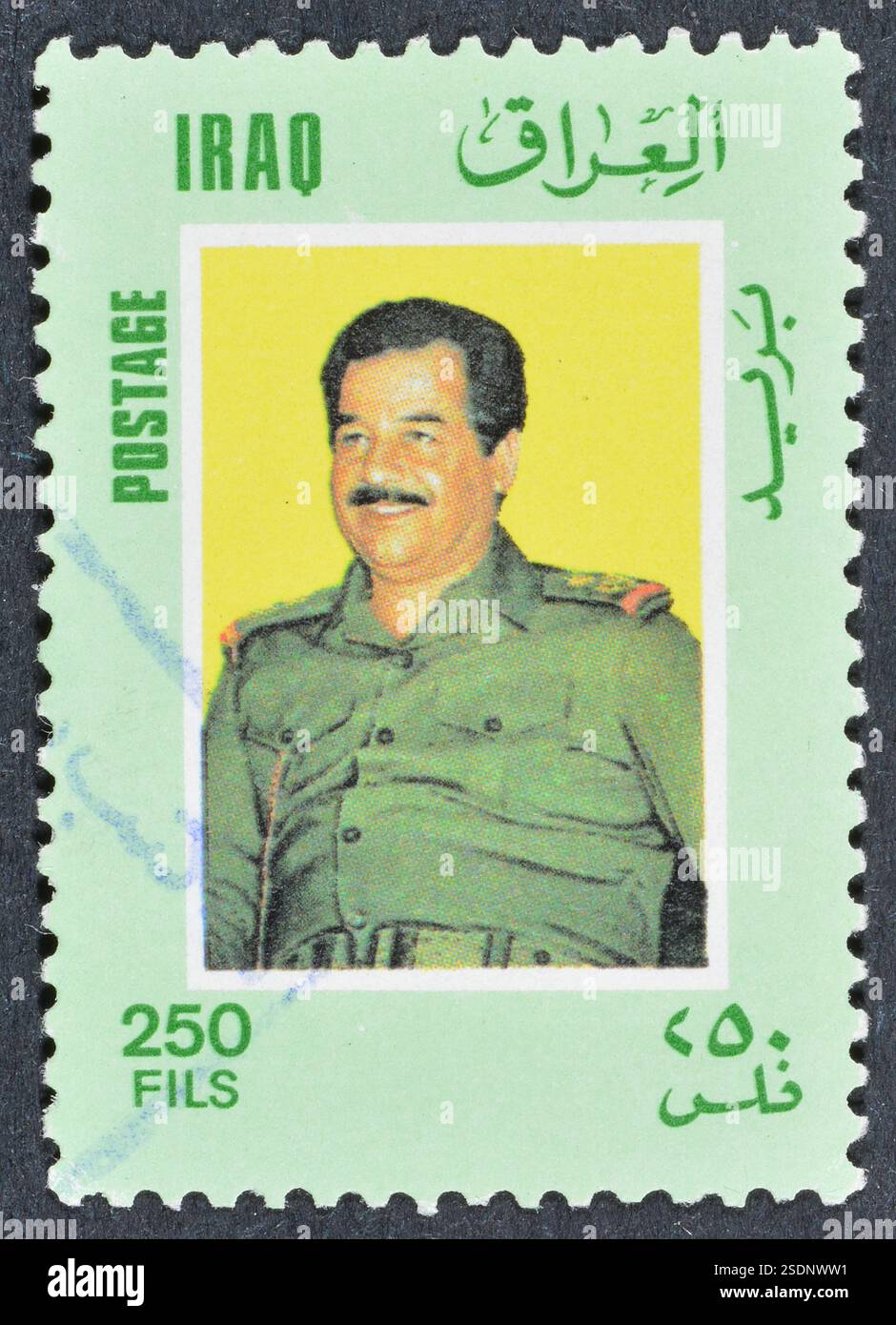 Cancelled postage stamp printed by Iraq, that shows President Saddam ...