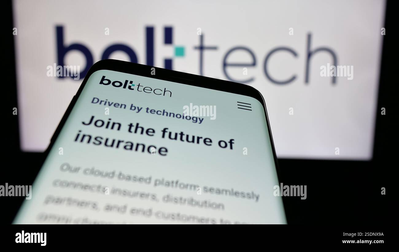In this photo illustration, a mobile phone with the website of ...