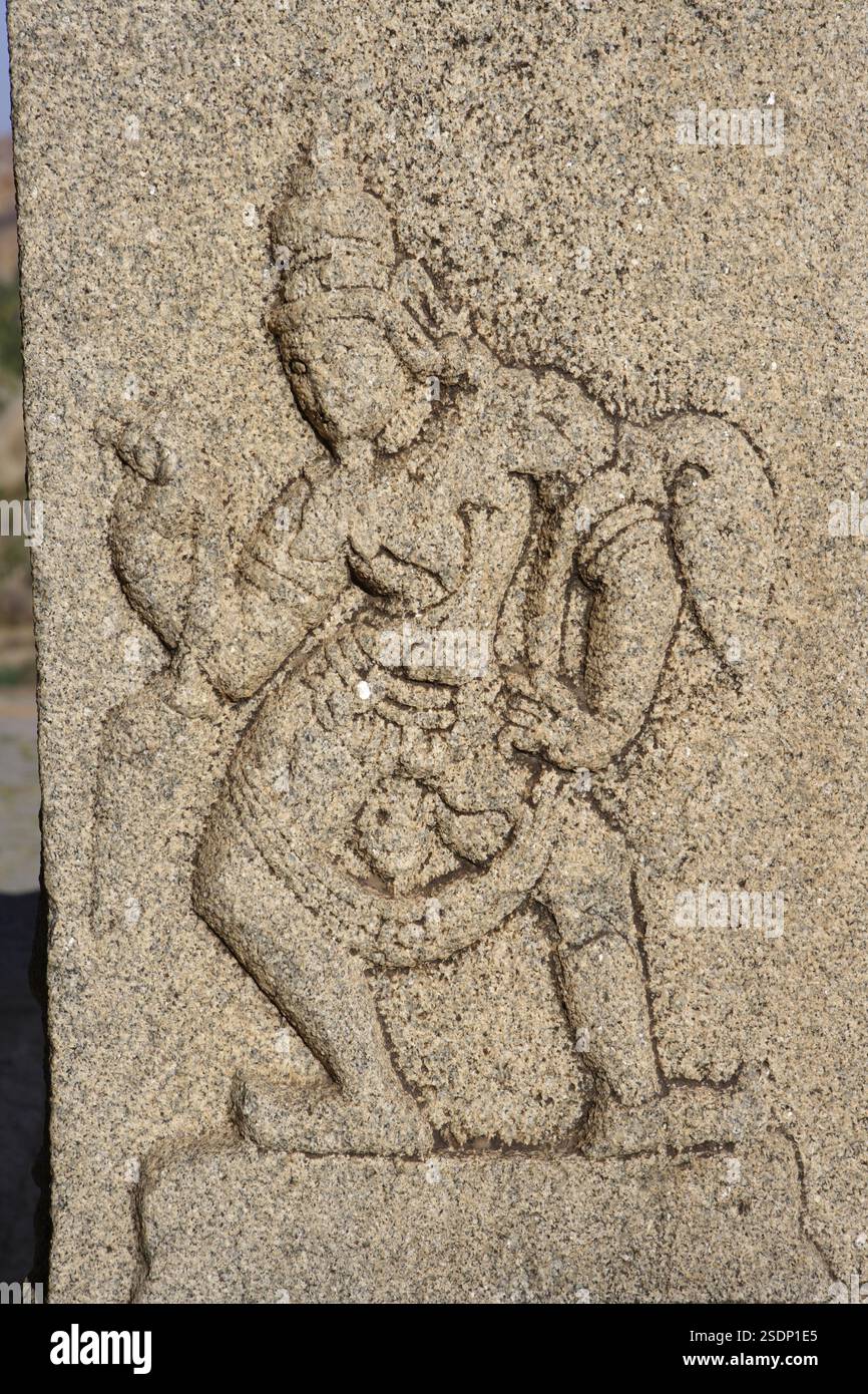Carved statue on pillar in Kadalekalu Ganesha temple, Hemkuta hill ...