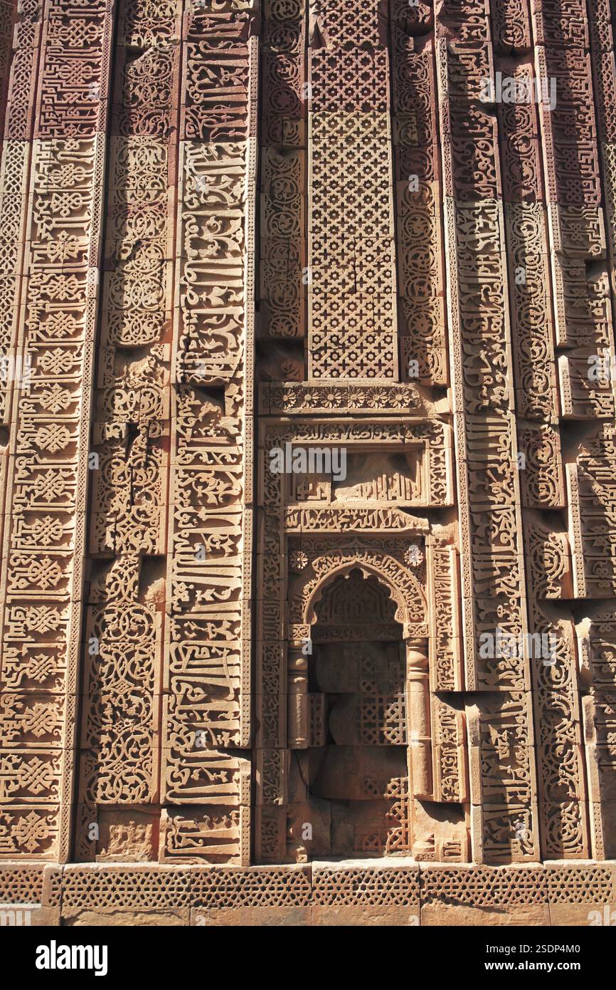 Islamic ornamentation on Qutab Minar complex built in 1311 red ...