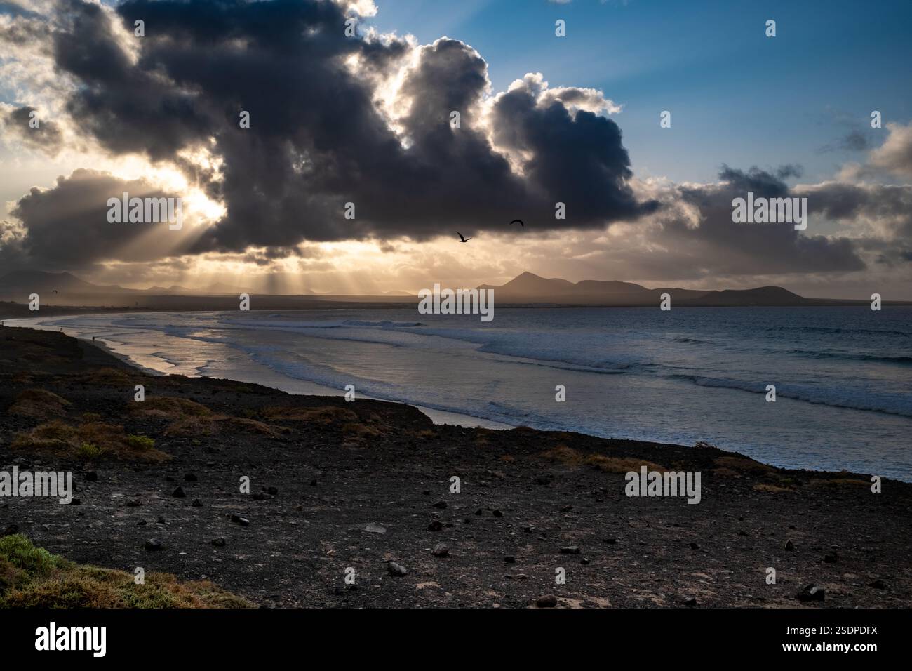 Breathtaking volcanic scenery with ebony sands, dramatic peaks, and ...