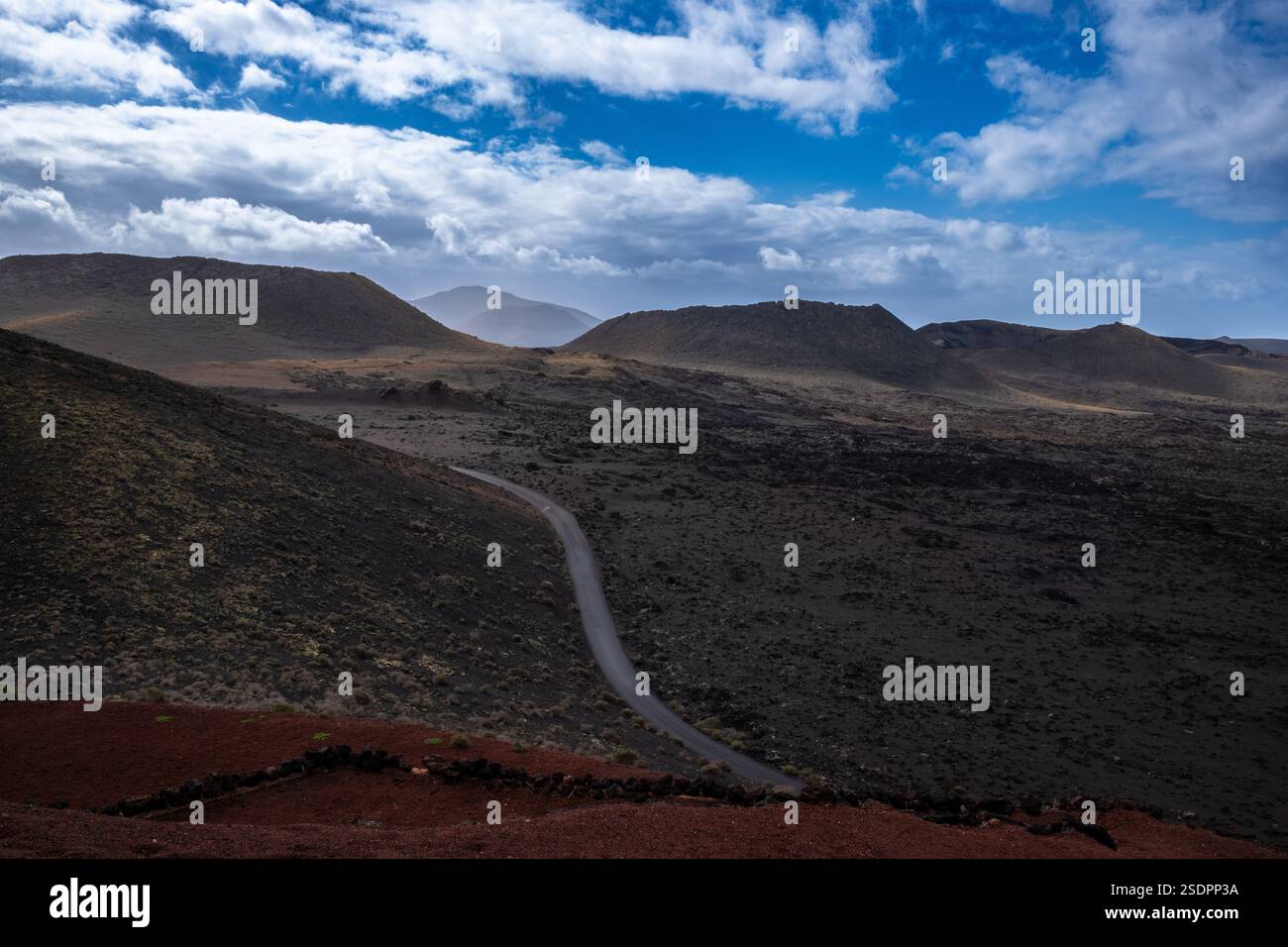 Breathtaking volcanic scenery with ebony sands, dramatic peaks, and ...