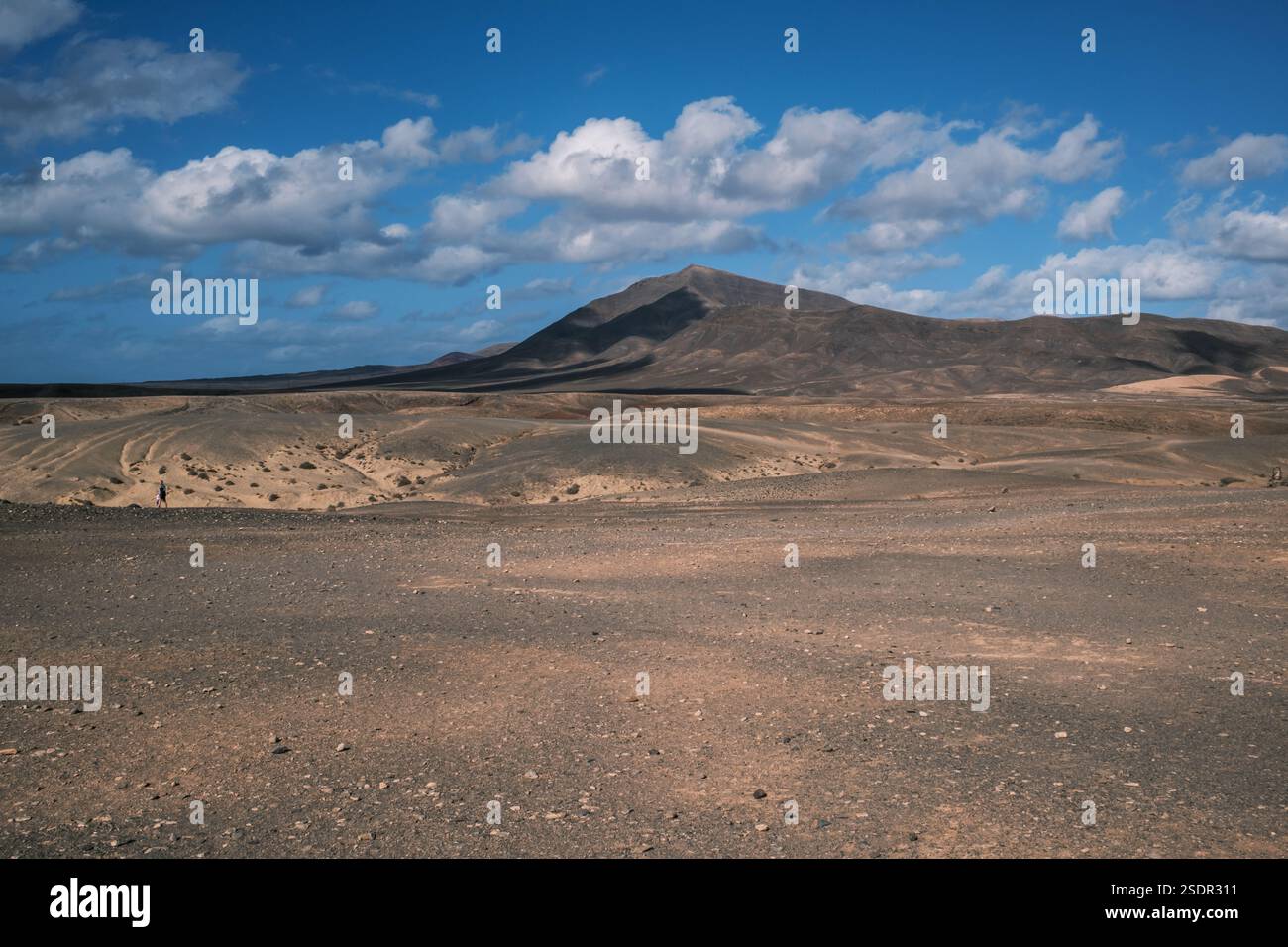Breathtaking volcanic scenery with ebony sands, dramatic peaks, and ...