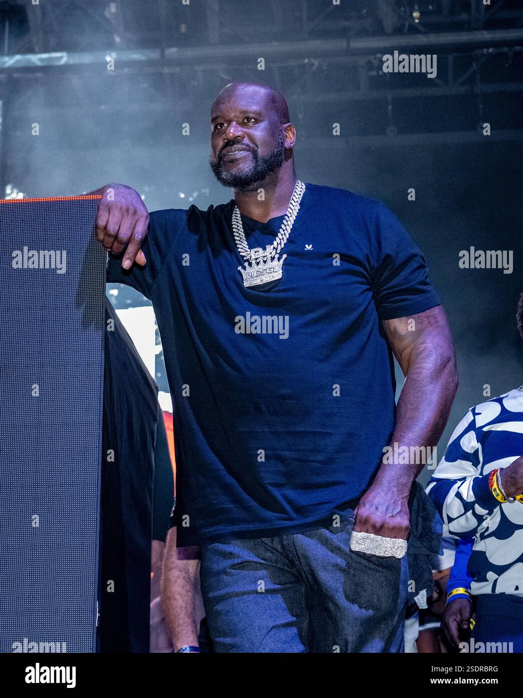 Shaquille O'Neal watches Ludacris perform during Shaq's Funhouse on ...