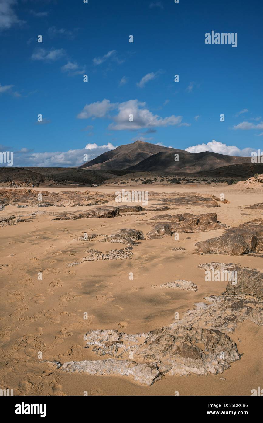 Breathtaking volcanic scenery with ebony sands, dramatic peaks, and ...