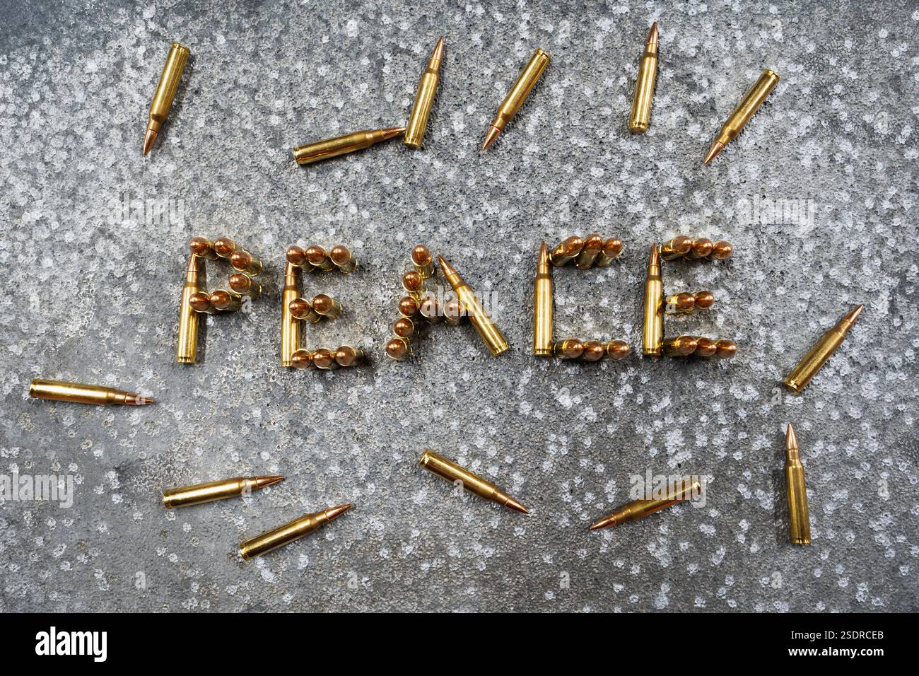 The word "peace" written on it is made from gun cartridges, on a steel ...