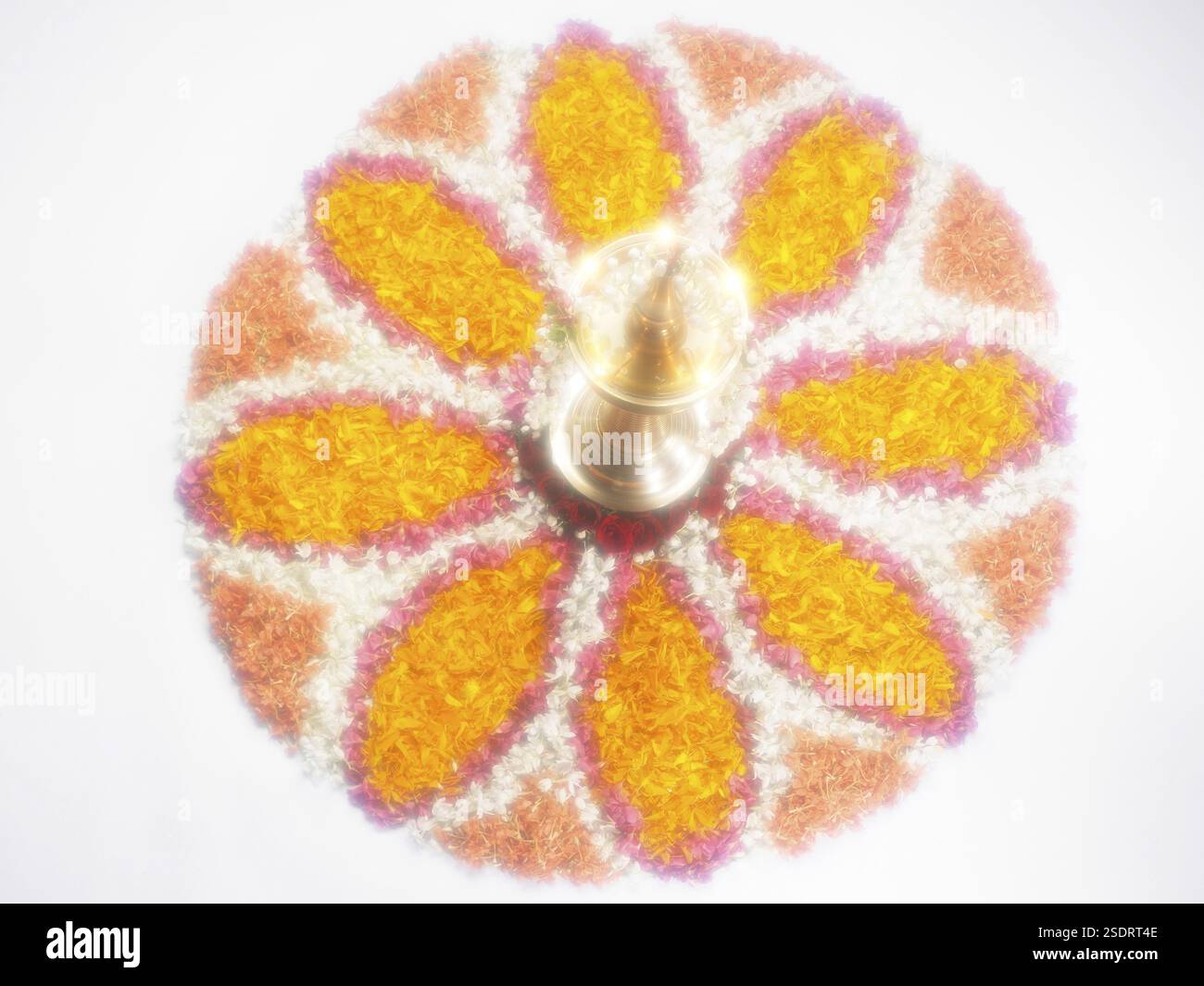 Onam Kerala festival, diya with flower design Stock Photo - Alamy