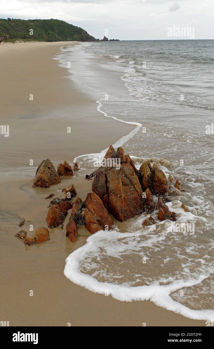 Surf waves dash on rock at beach, Village Bhogwe, Konkan, District ...
