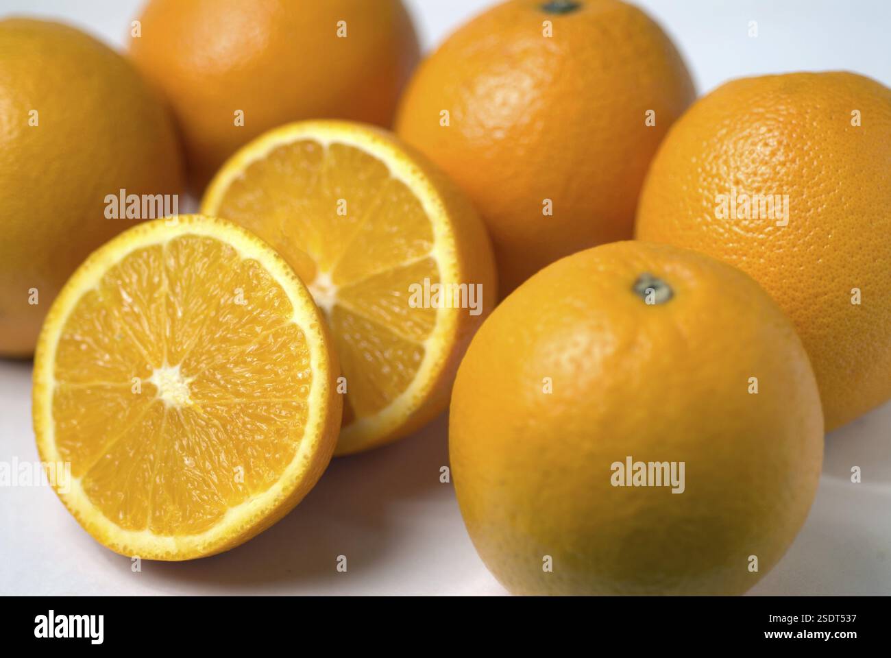 Orange fruit round citrus few cut in half white background Stock Photo ...