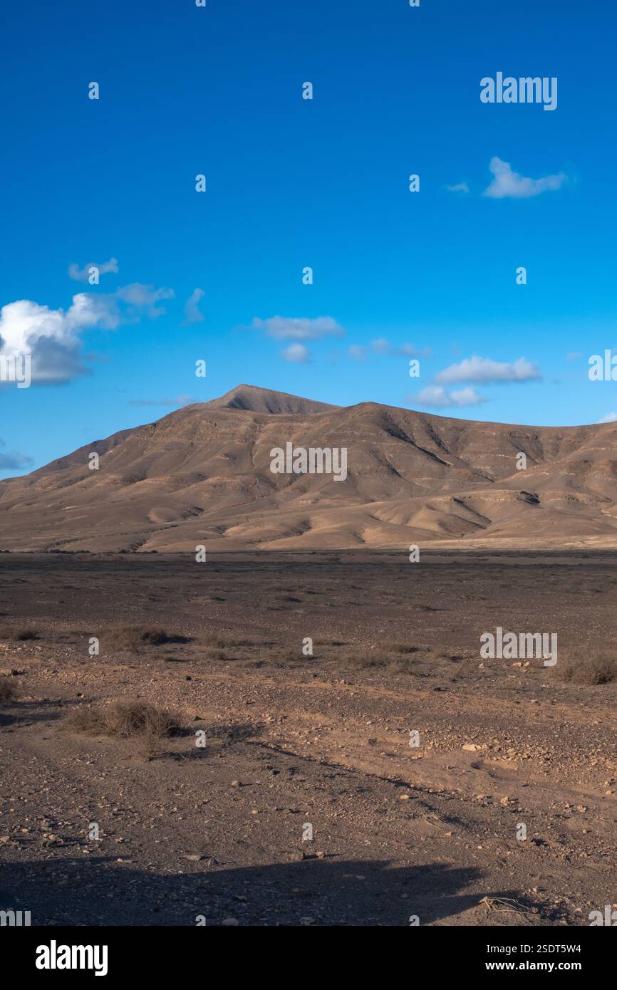 Breathtaking volcanic scenery with ebony sands, dramatic peaks, and ...