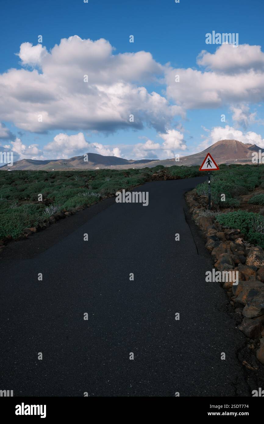 Breathtaking volcanic scenery with ebony sands, dramatic peaks, and ...