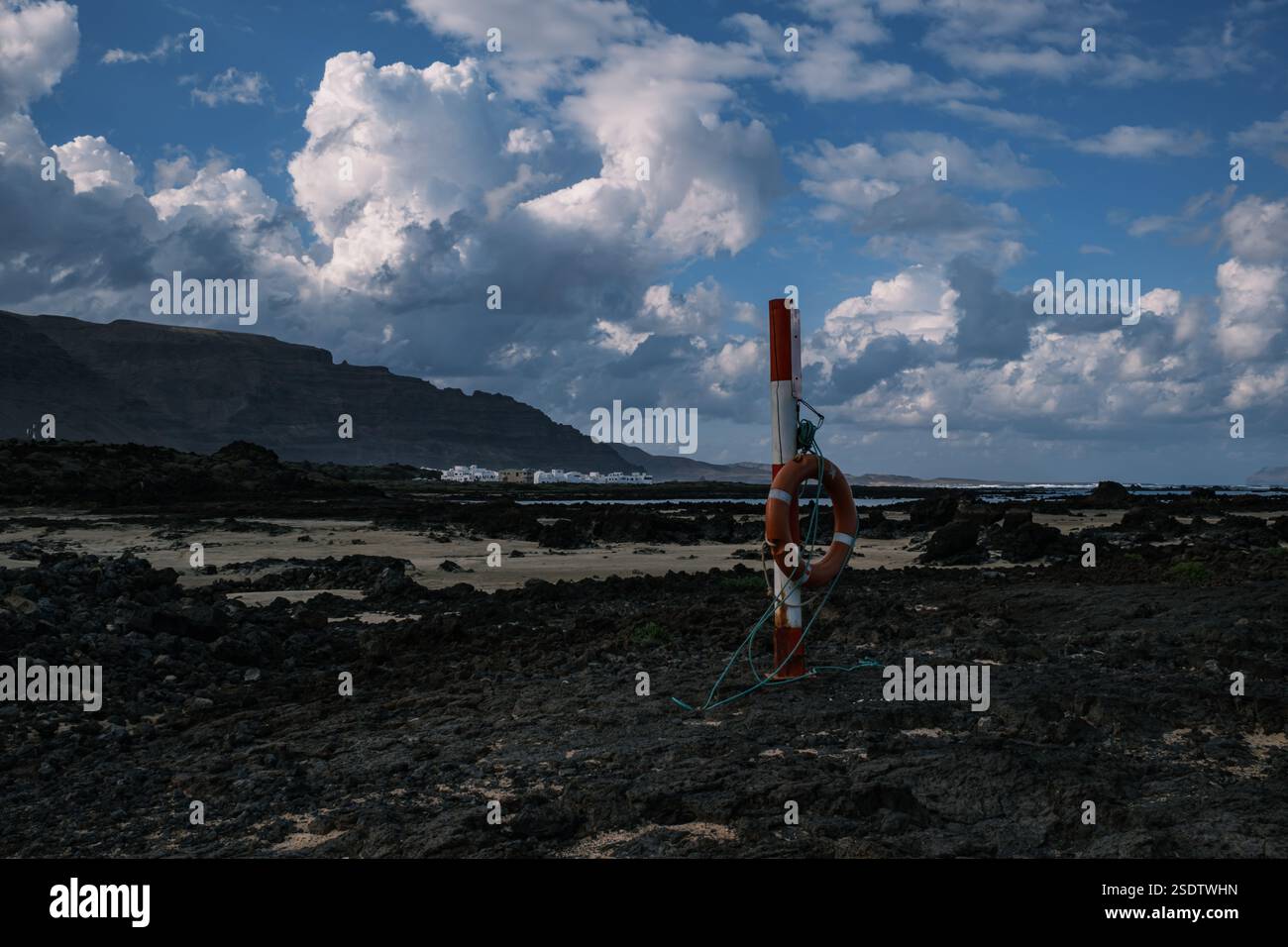 Breathtaking volcanic scenery with ebony sands, dramatic peaks, and ...