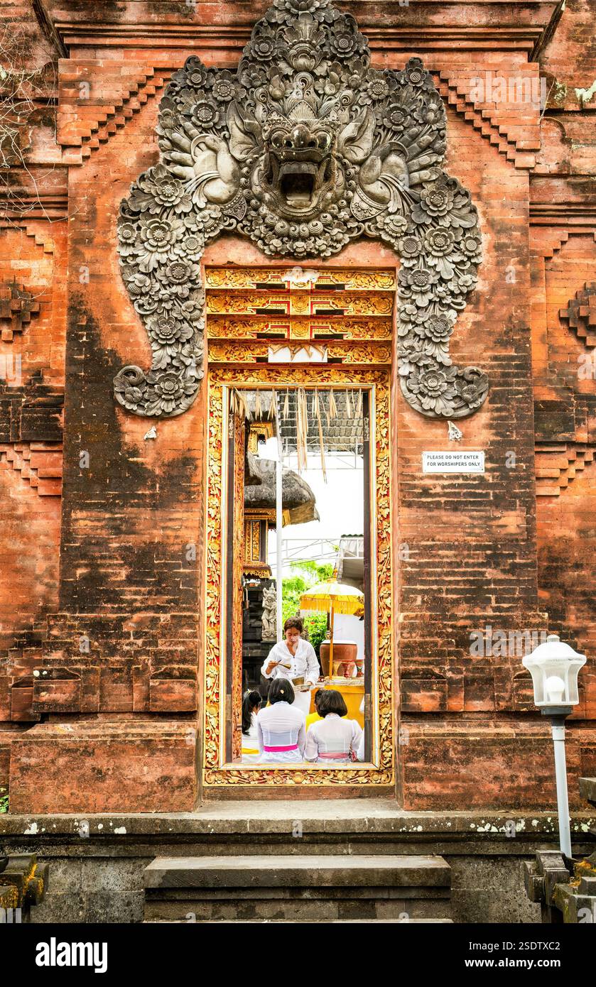Bali, Indonesia - November 30, 2023: A Balinese priest performs a ...