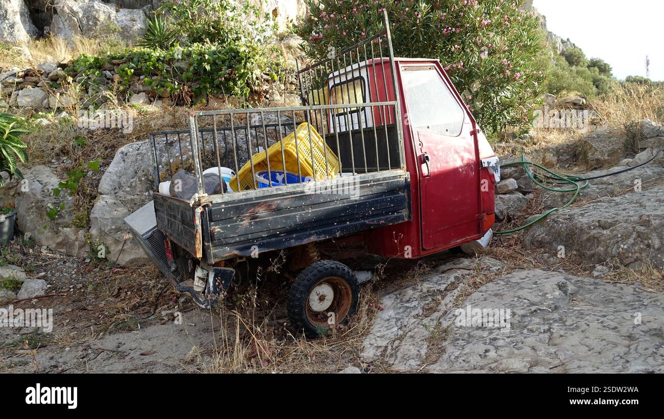 An abandoned tricycle van on a hill Stock Photo - Alamy