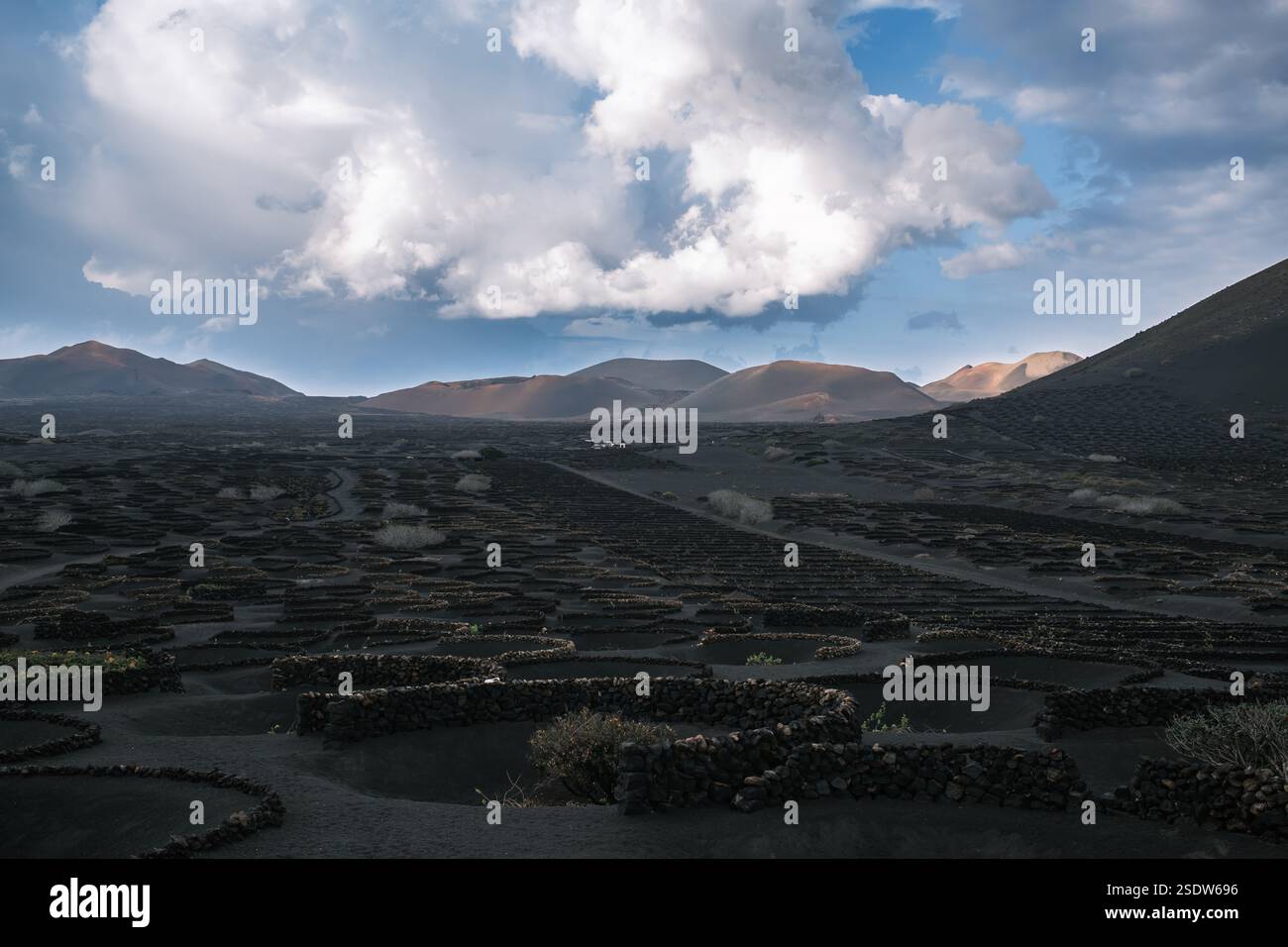 Breathtaking volcanic scenery with ebony sands, dramatic peaks, and ...