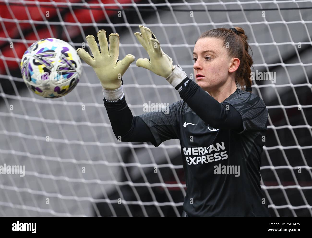 Brighton and Hove Albion goalkeeper Sophie Baggaley warms up ahead of ...