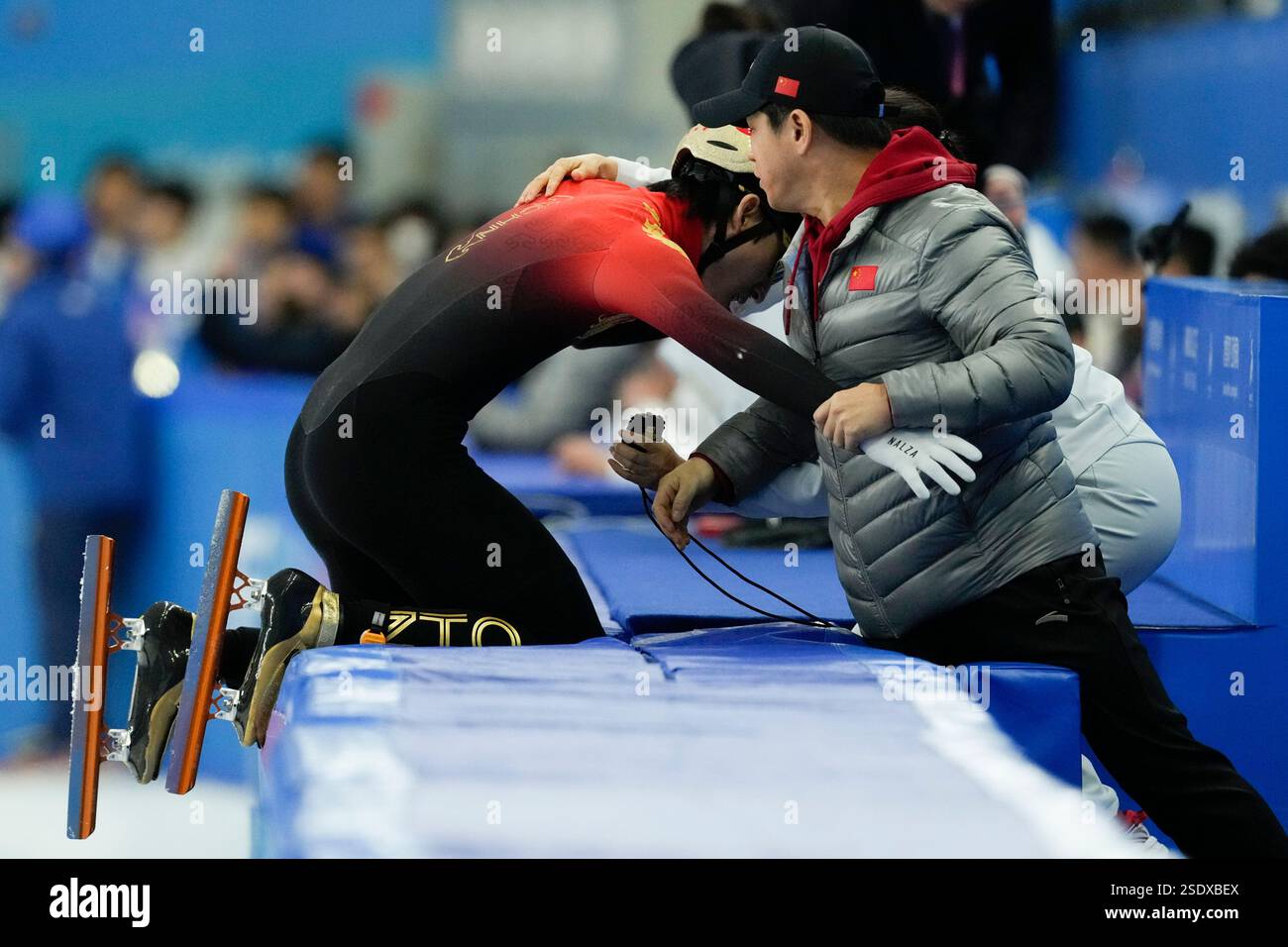 China's Lin Xiaojun celebrates with his team after winning gold at the ...