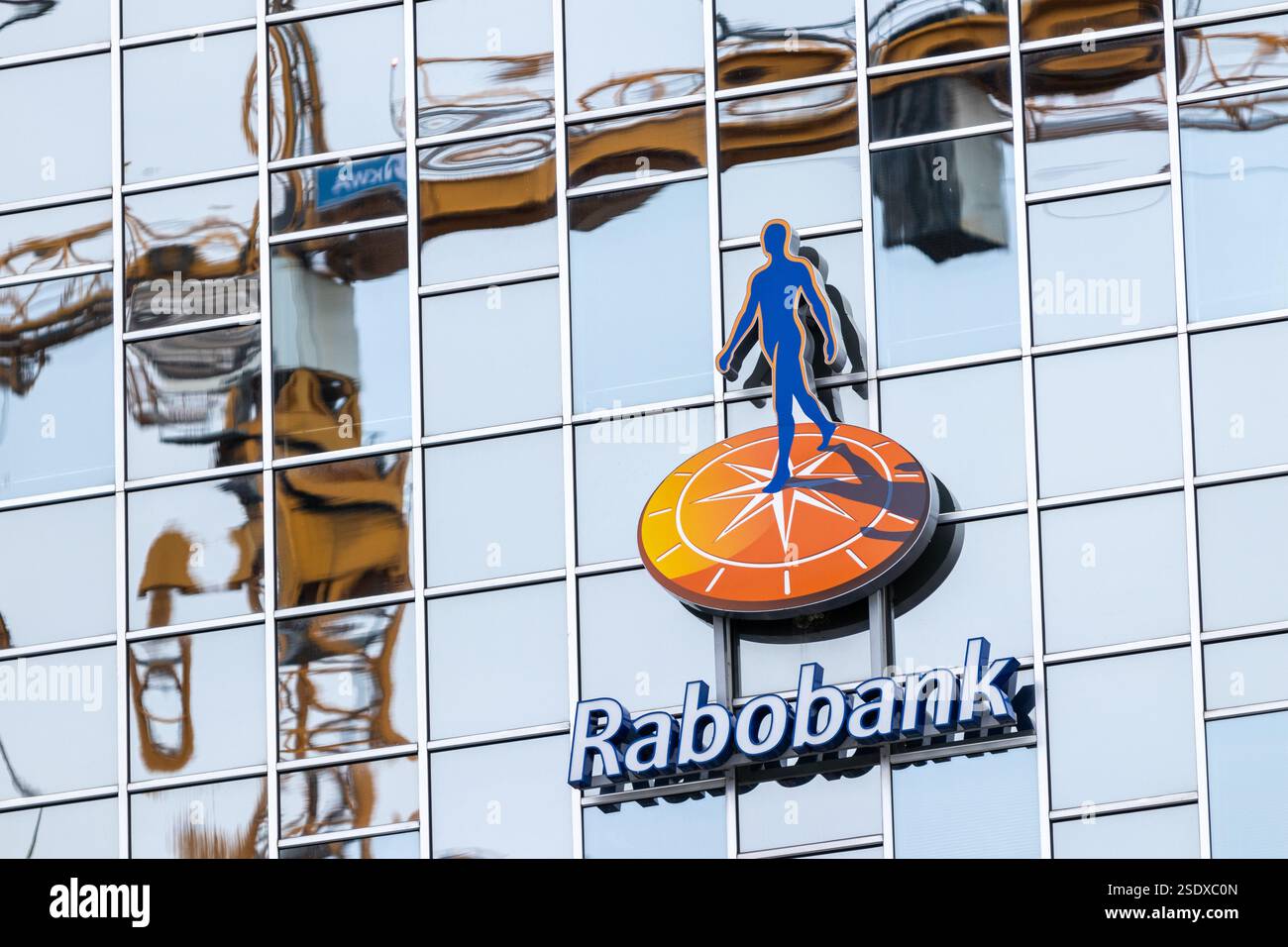 Rabobank logo on the headquarters building. Reflection of a ...