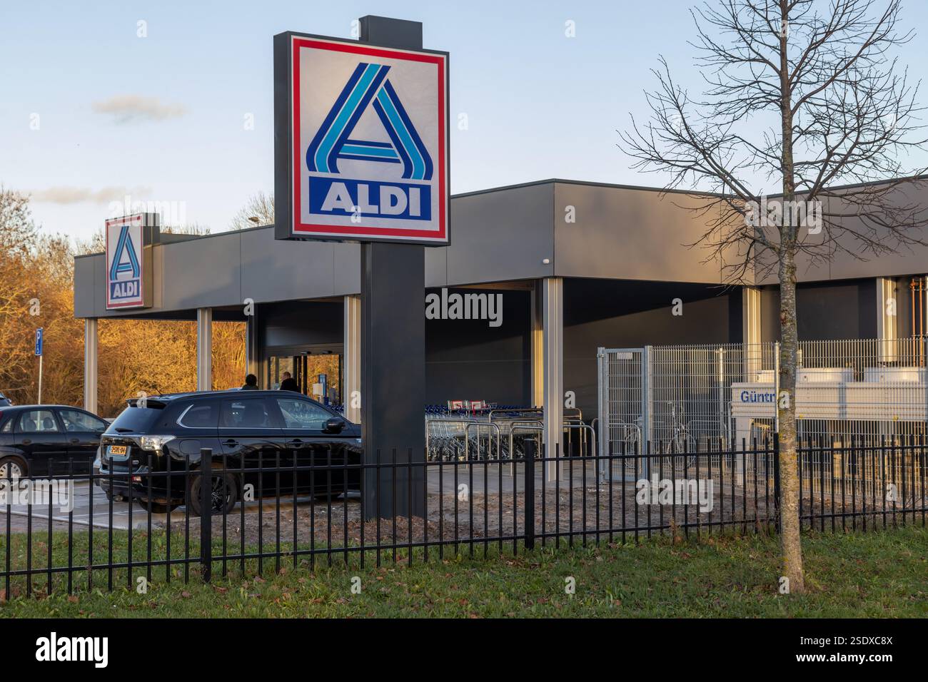 Aldi logo illuminated at the shop, Aldi supermarket groceries store, a ...