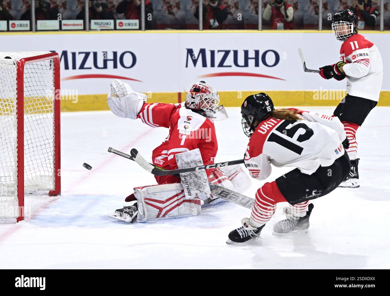 Ukita Rui (R 15) of Japan Women's Ice Hockey National Team scores the ...