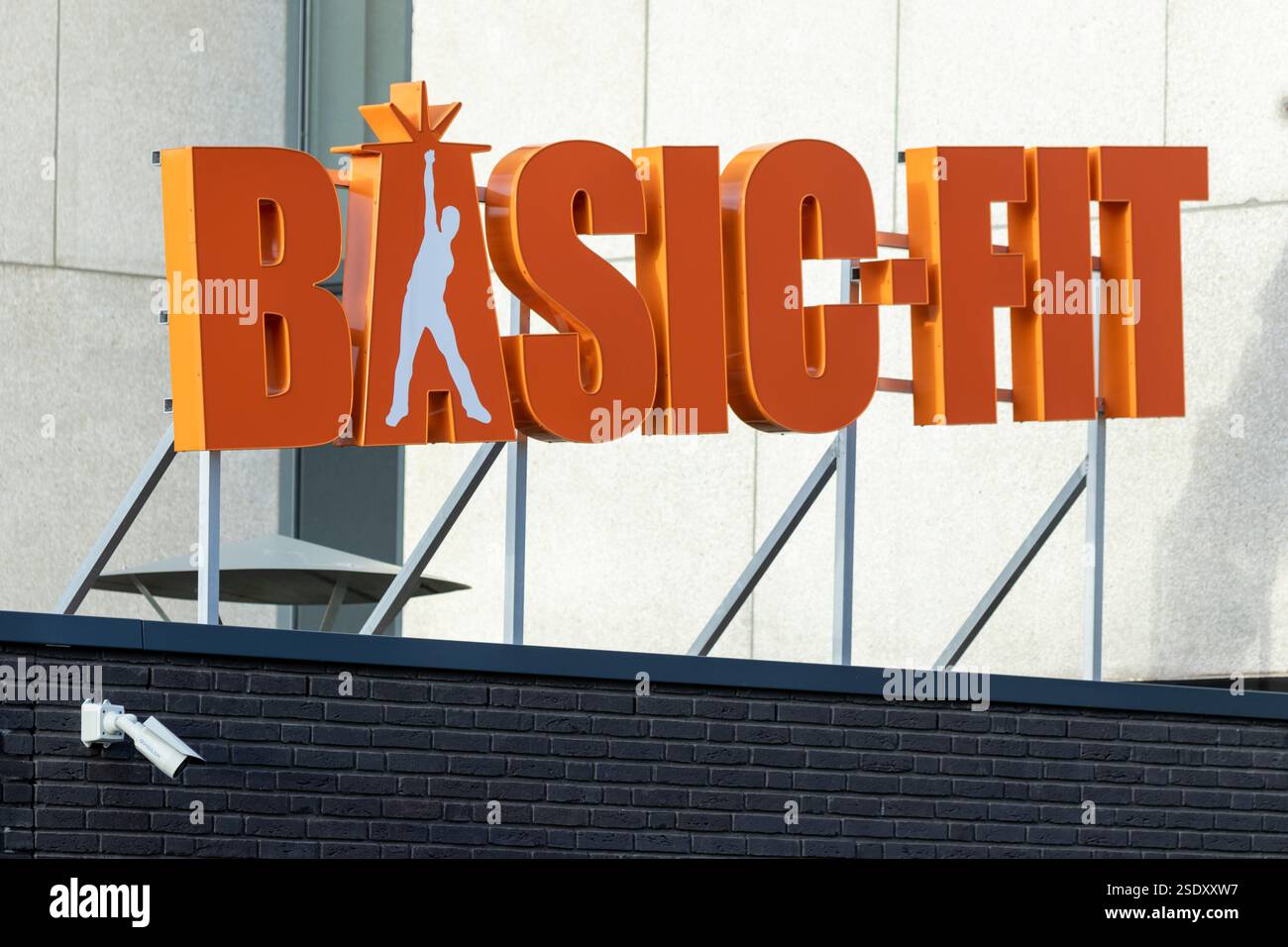 Basic Fit logo at the gym. Basic-Fit is the largest fitness chain in ...