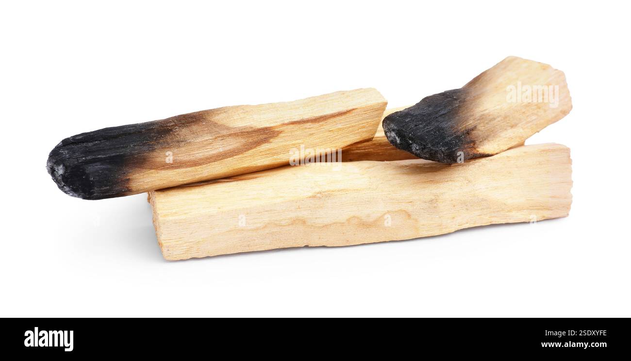 Whole and burnt palo santo sticks on white background Stock Photo - Alamy