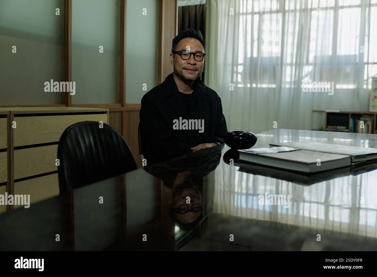 Hong Kong, China. 11th July, 2024. A portrait of Jonathan Li Tsz-chun, the Hong Kong-based ...
