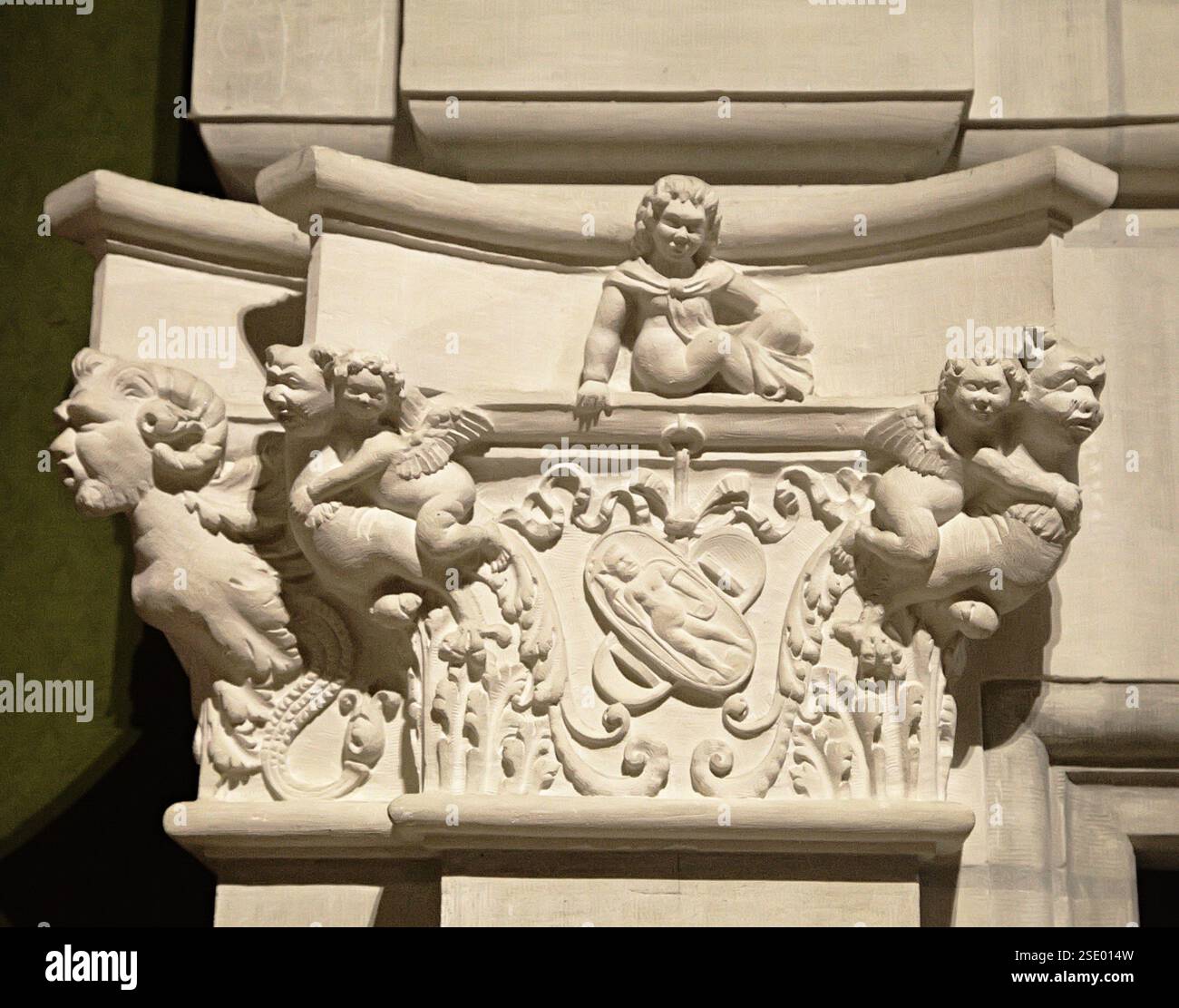 Chambord Castle features detailed sculptures of cherubs and mythical ...