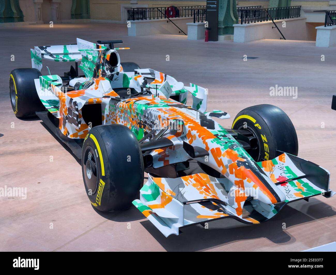 Artistic Formula One car showcasing vibrant camouflage design at ...