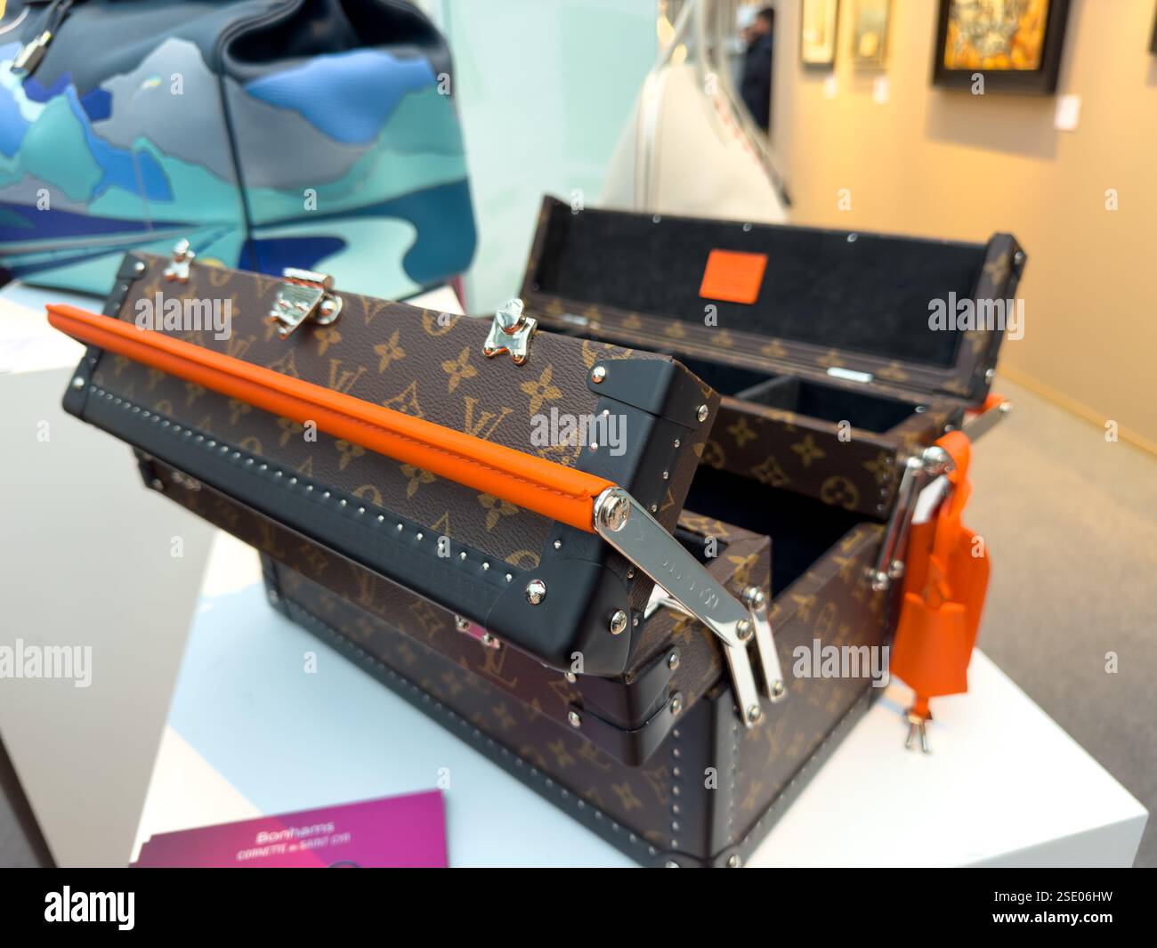 Unique luxury trunk showcasing craftsmanship in modern exhibition hall ...