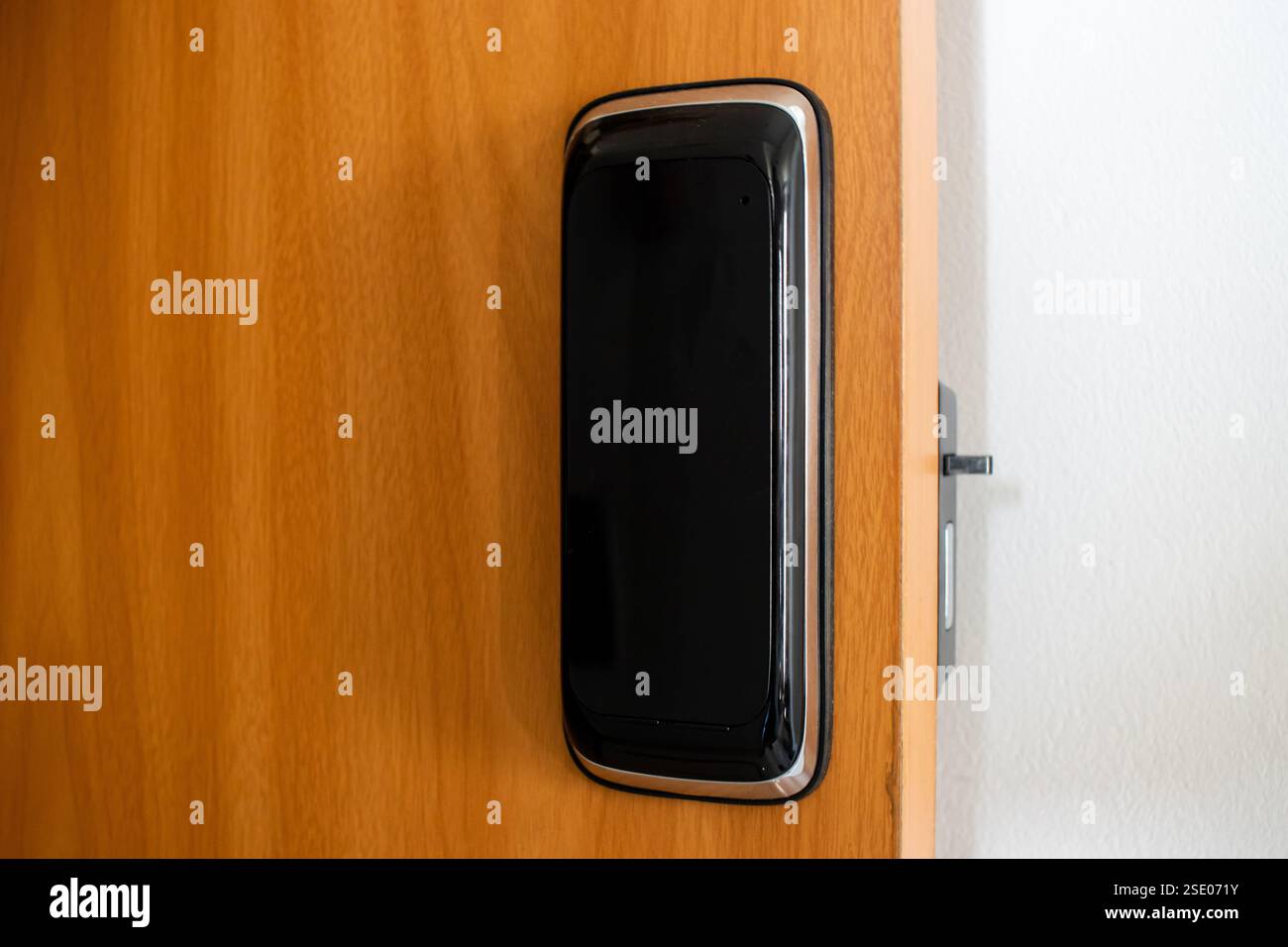Electronic lock installed on the door Stock Photo - Alamy