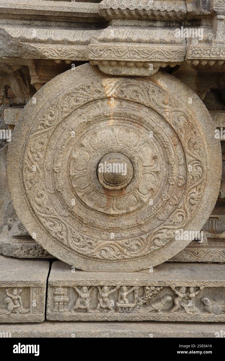 Stone chariot or ratha, left side front wheel, Vitthal temple, Hampi ...