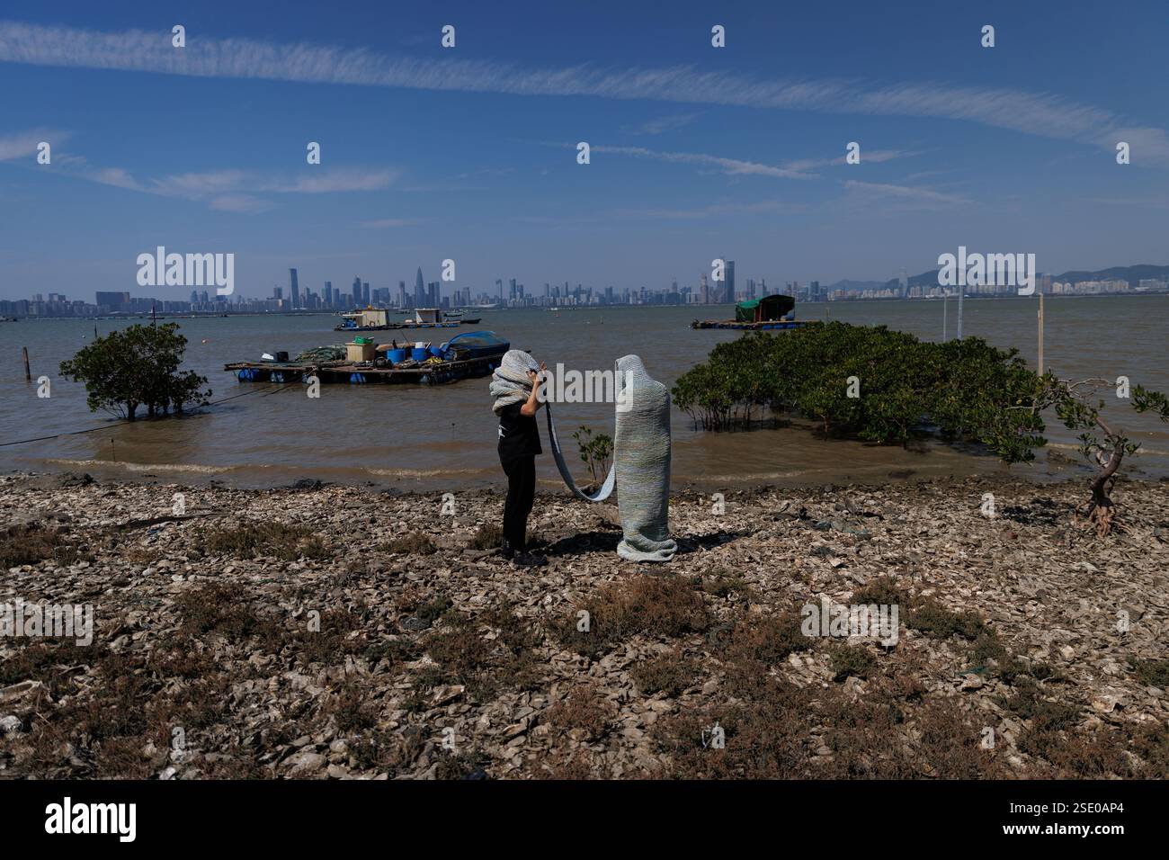Movana prepare her art piece of Body Container for the photo shoot near ...