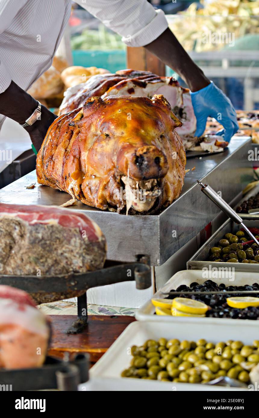 Roasted Pork sales at street market Stock Photo - Alamy