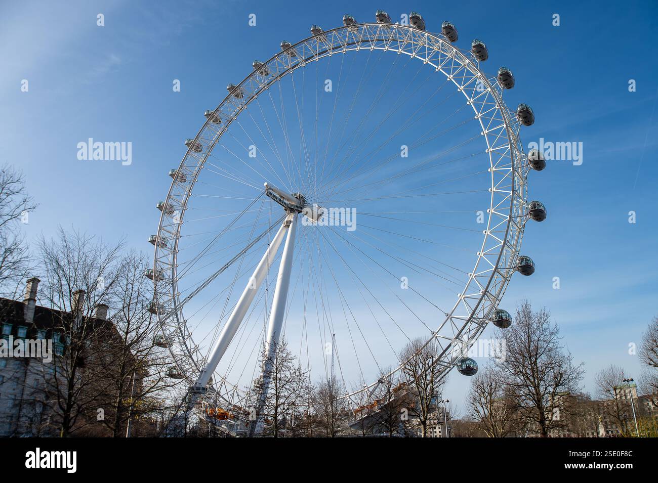 London, UK. 5th February, 2025. Blue skies above the London Eye which ...