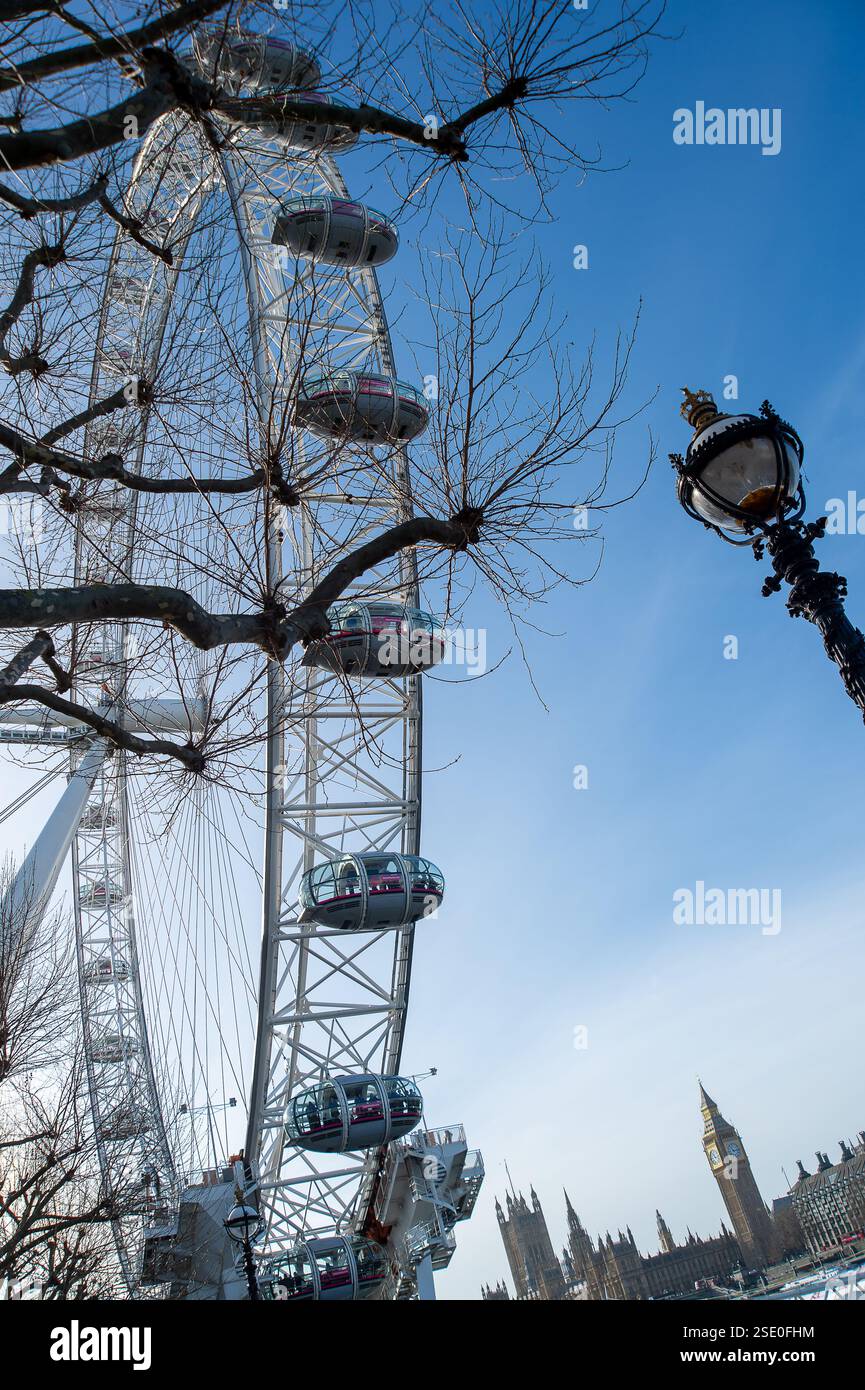 London, UK. 5th February, 2025. Blue skies above the London Eye which ...
